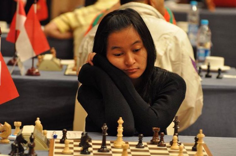 Hobi bermain barbie, Medina jadi Grandmaster catur